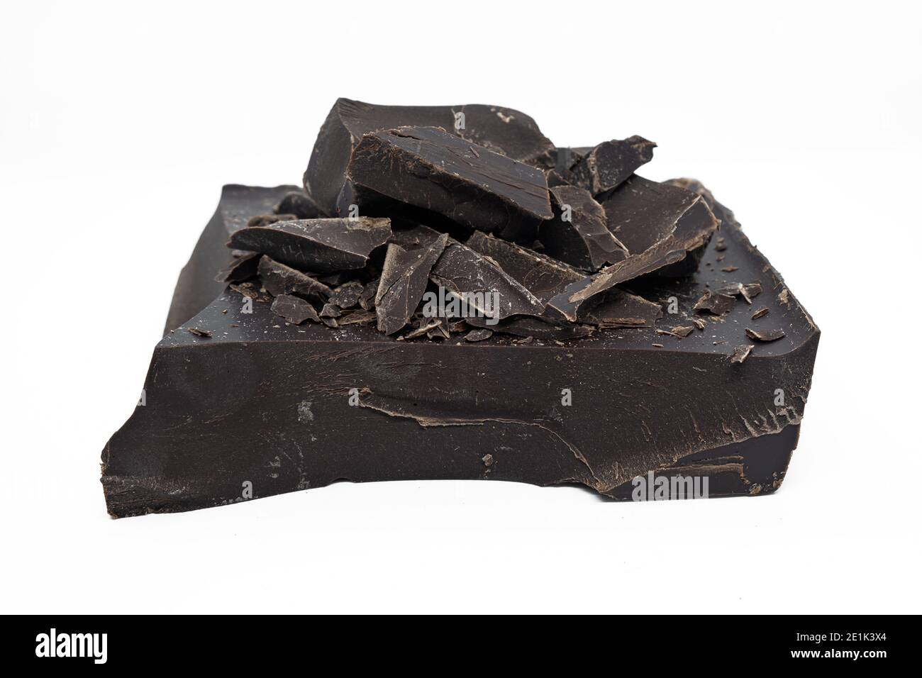 dark chocolate chunks isolated on white background Stock Photo - Alamy