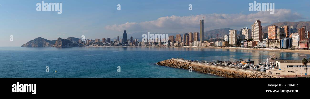 Skyline of Benidorm view over blue cloudy sky. Spanish famous touristic ...