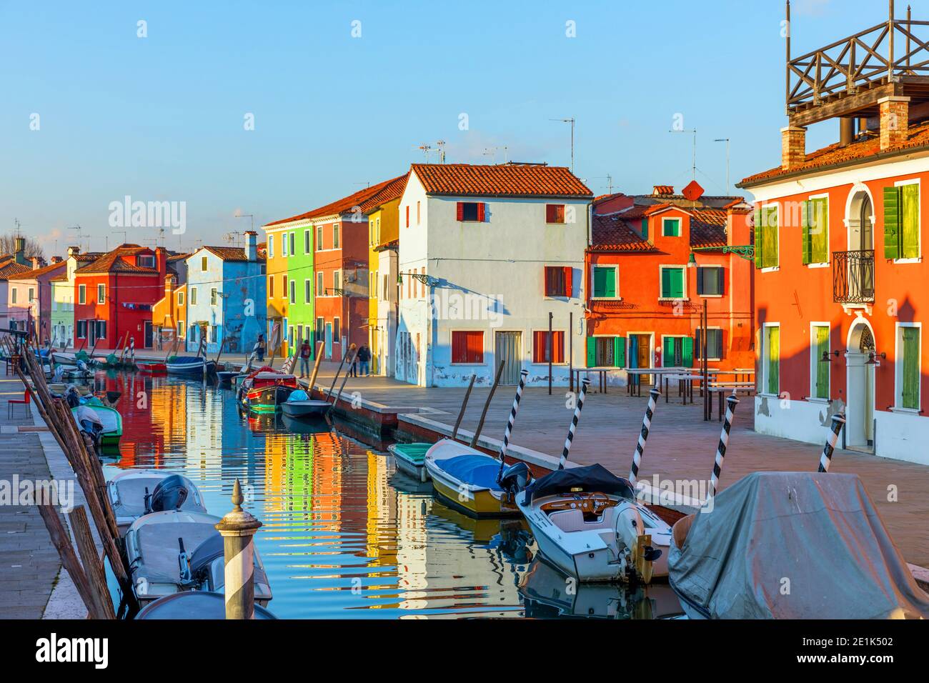 Street with colorful buildings in Burano island, Venice, Italy ...
