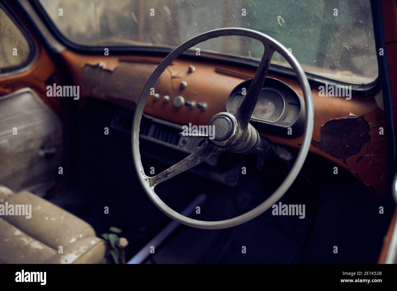 Interior of an old vintage car wreck in an old street Stock Photo - Alamy