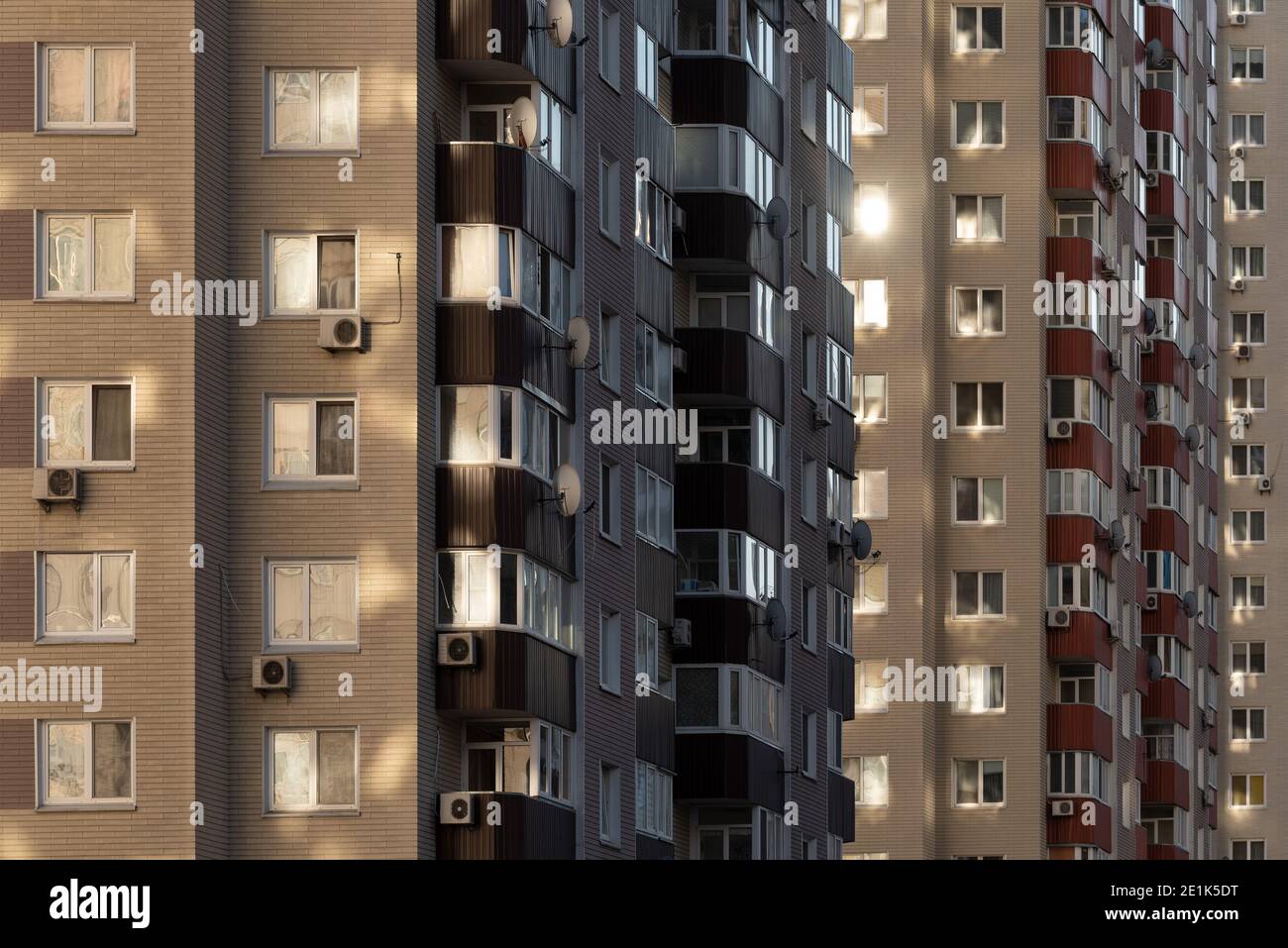 Abstract architectural background with apartment buildings in a growing ...
