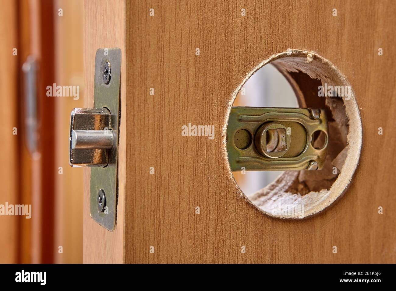 Interior door lock latch at stage of doorknob installation Stock Photo ...