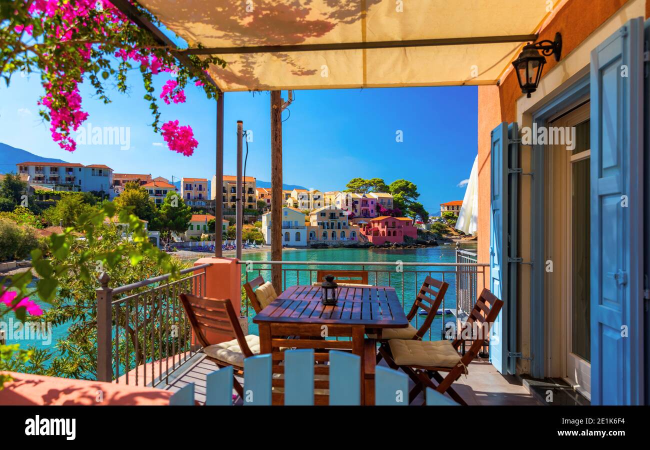 Traditional street with greek houses with flowers in Assos, Kefalonia ...