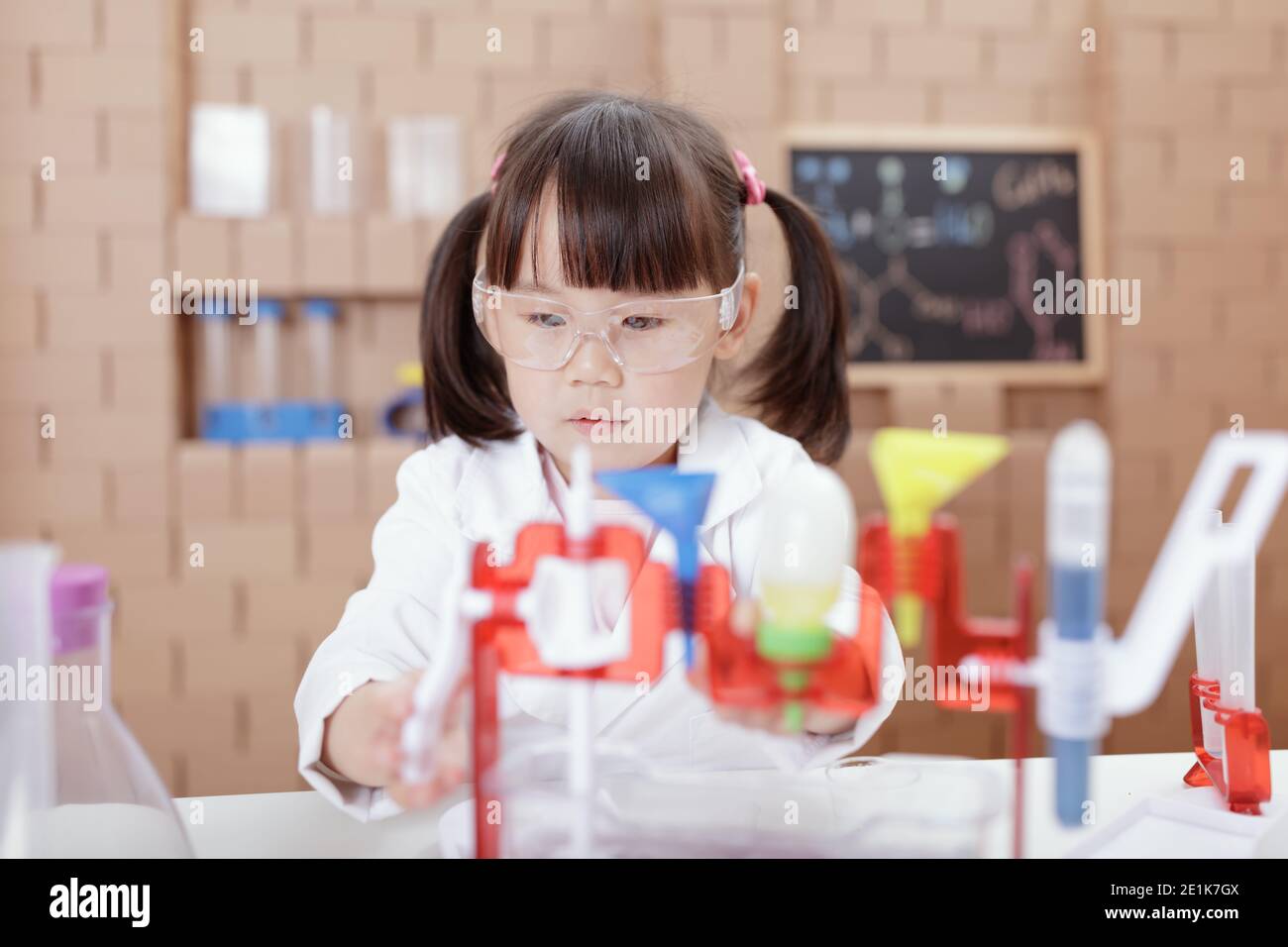 young girl play science experiments for homeschooling Stock Photo - Alamy