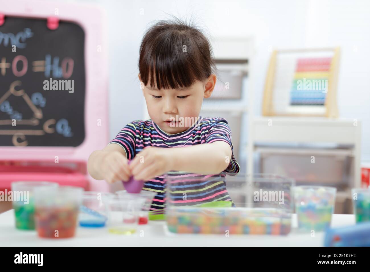 young girl play science experiments for homeschooling Stock Photo - Alamy