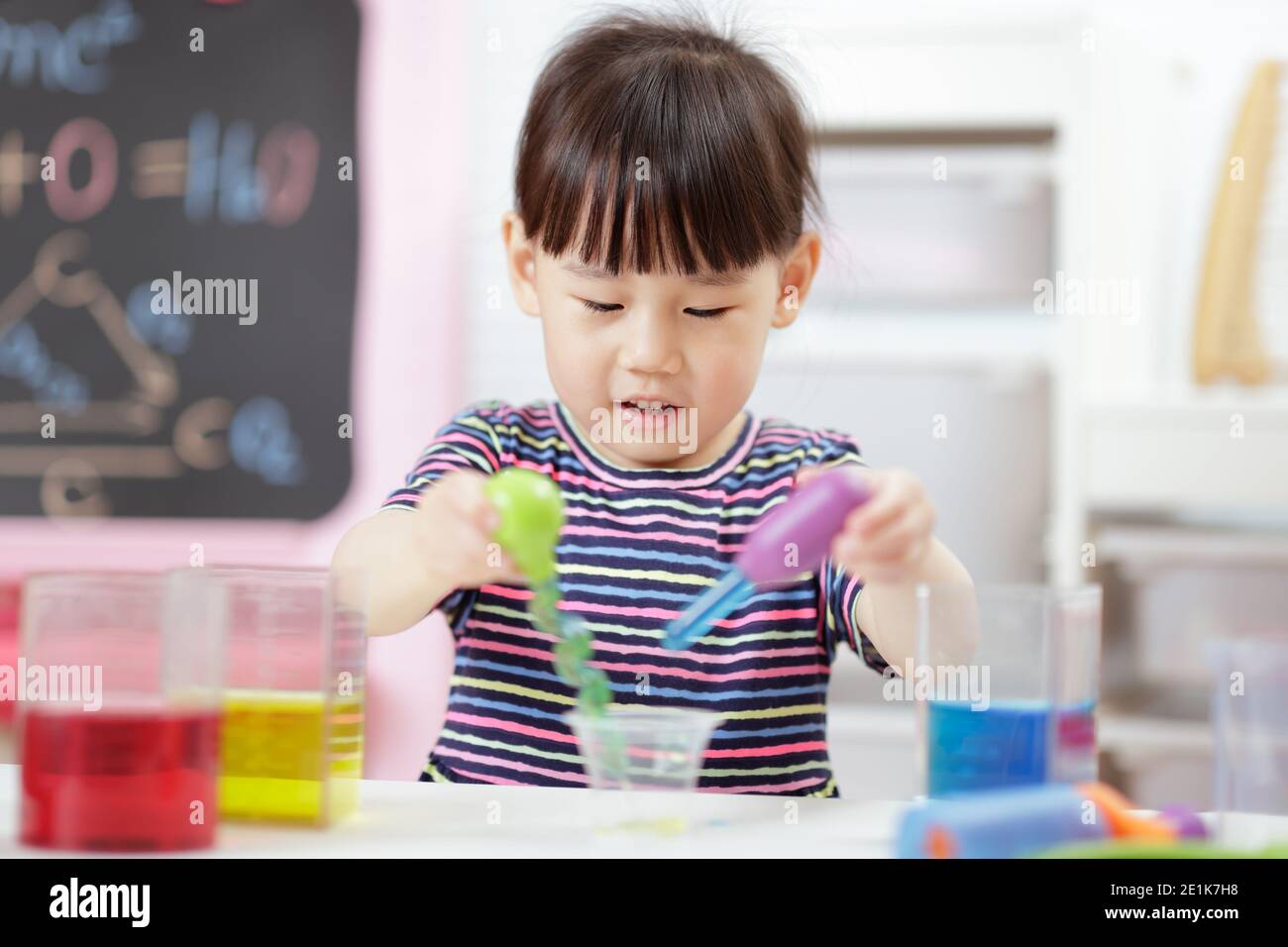 young girl play science experiments for homeschooling Stock Photo - Alamy