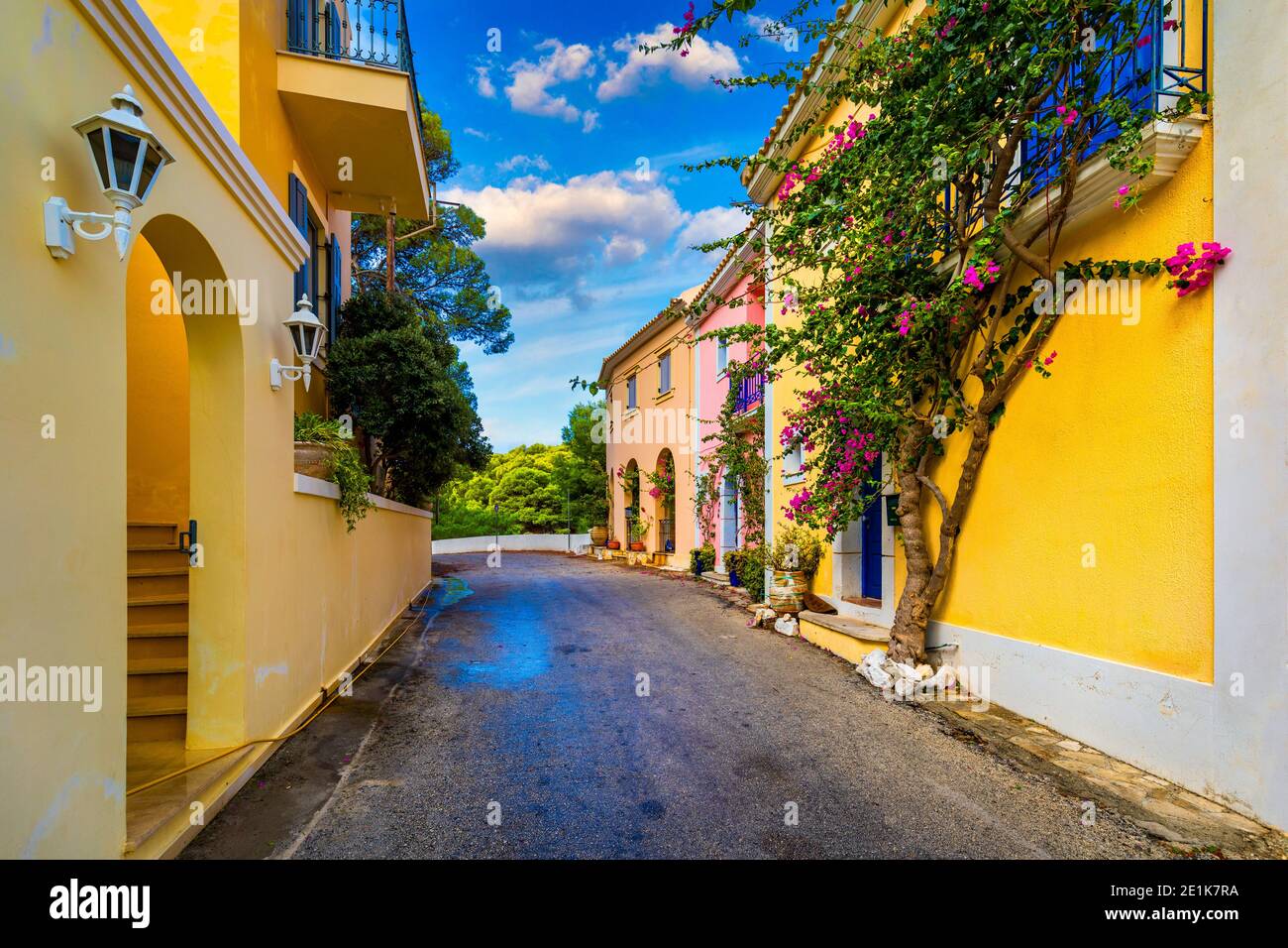 Traditional street with greek houses with flowers in Assos, Kefalonia ...