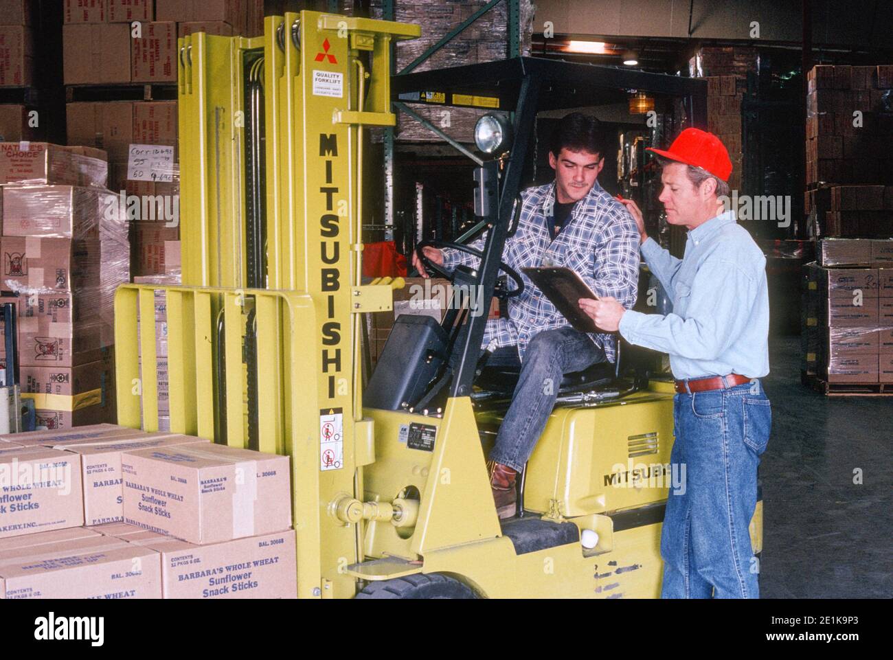 Supervisor Checking Forklift Driver's Load, USA Stock Photo - Alamy