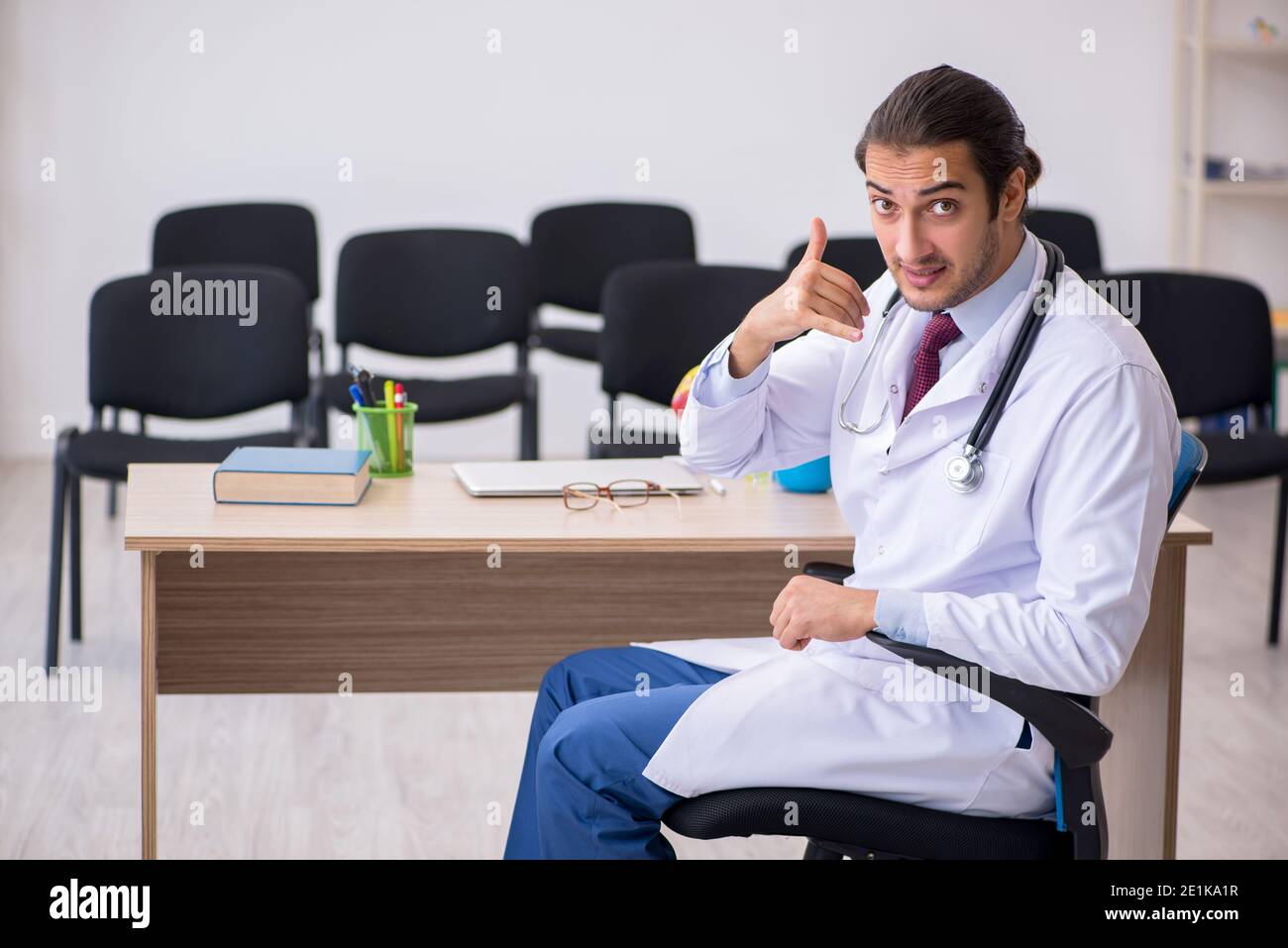 Young doctor giving seminar in the classroom Stock Photo - Alamy