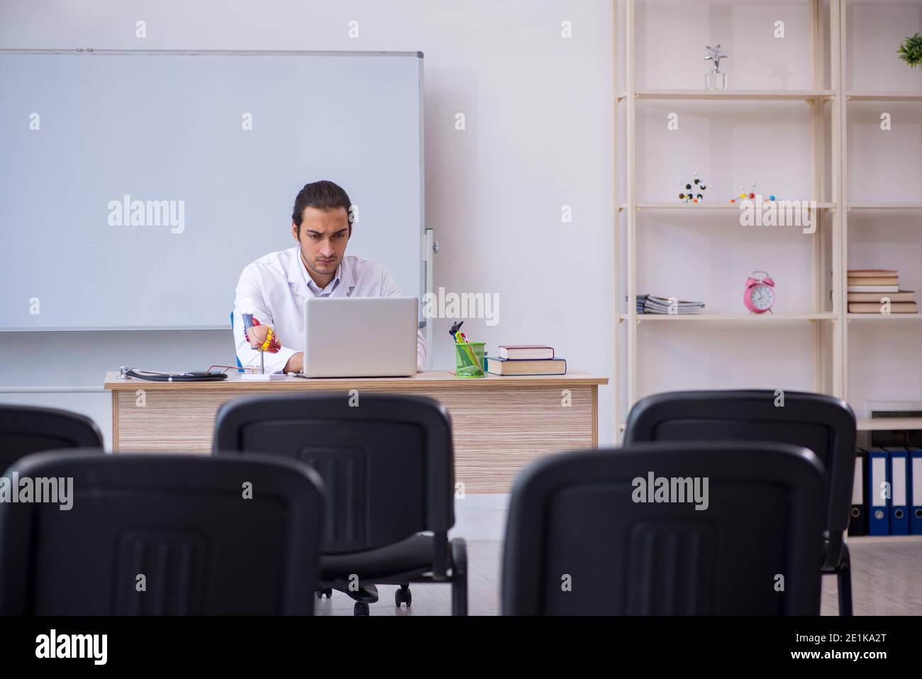 Young doctor giving seminar in the classroom Stock Photo - Alamy