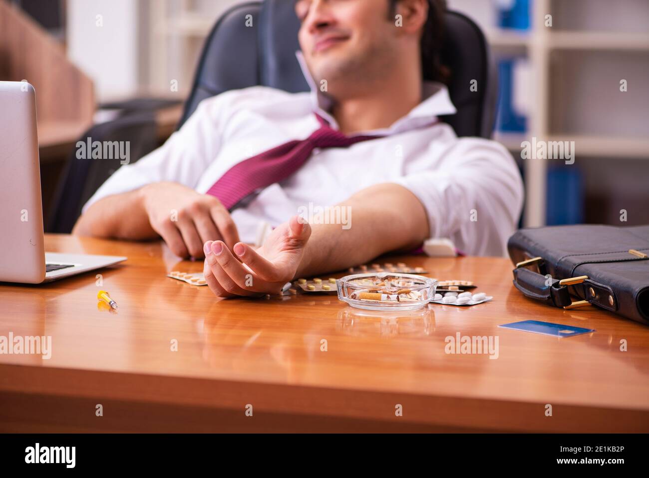 Drug use sitting drug intoxication hi-res stock photography and images ...