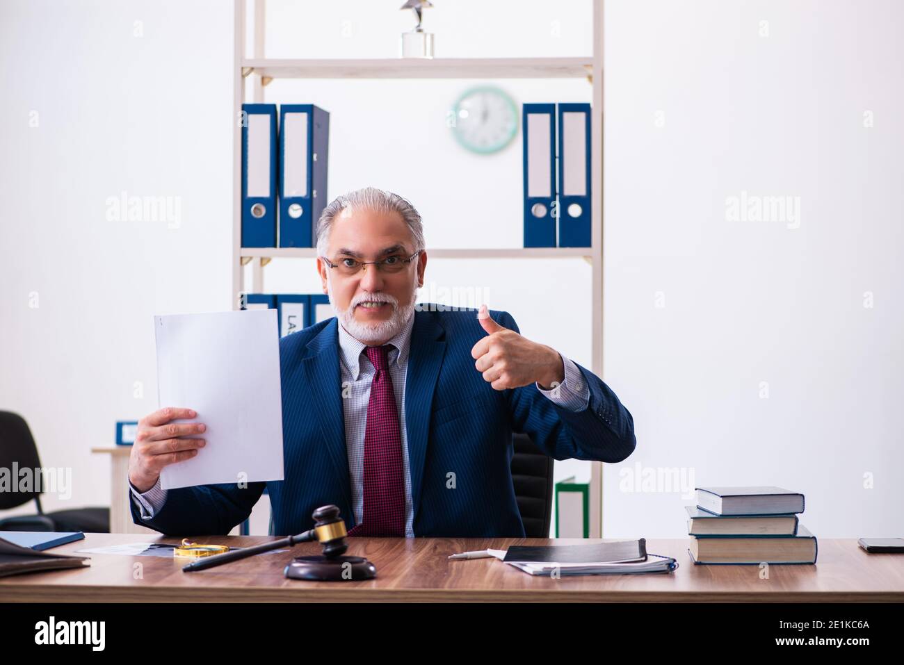 Experienced judge sitting in the office Stock Photo - Alamy