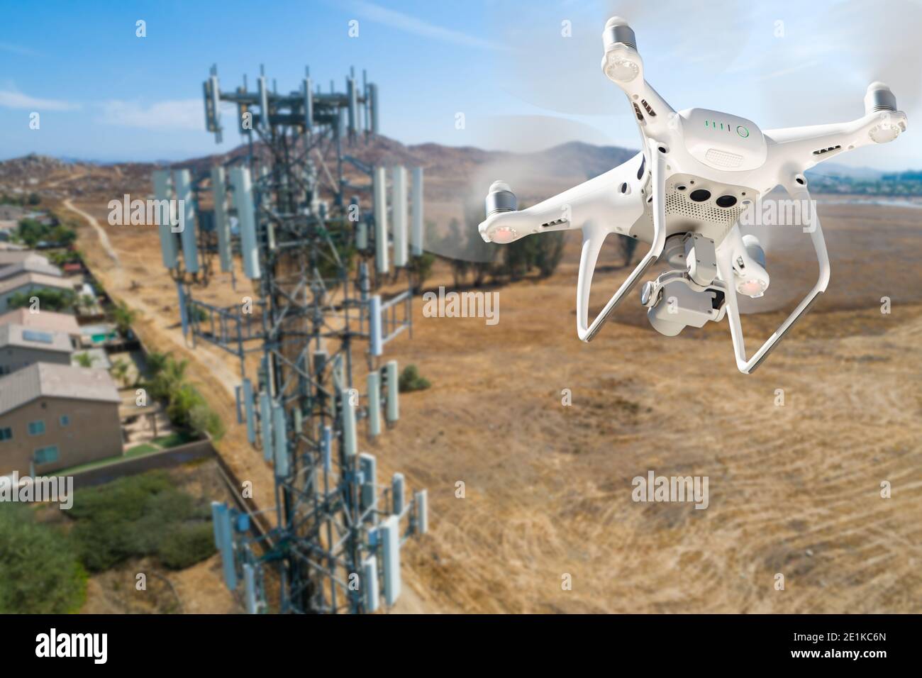 Unmanned Aircraft Drone Flying Near and Inspecting Cell Tower Stock ...