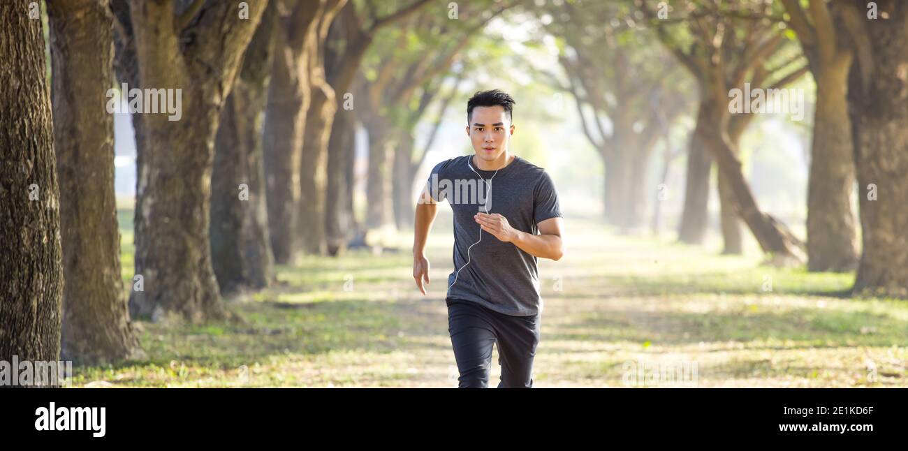 Handsome man running hi-res stock photography and images - Alamy