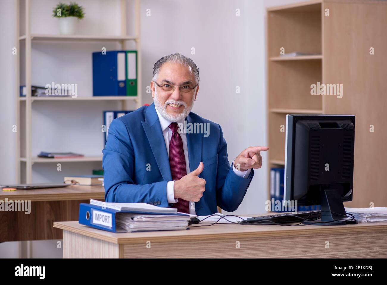 Male boss employee working in the office Stock Photo - Alamy