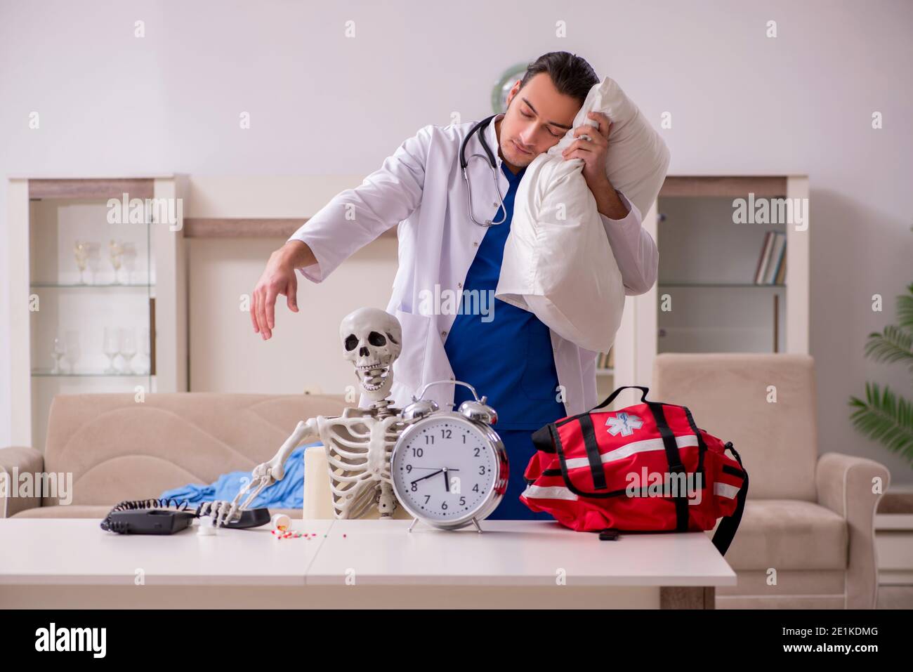 Male paramedic visiting skeleton patient Stock Photo - Alamy