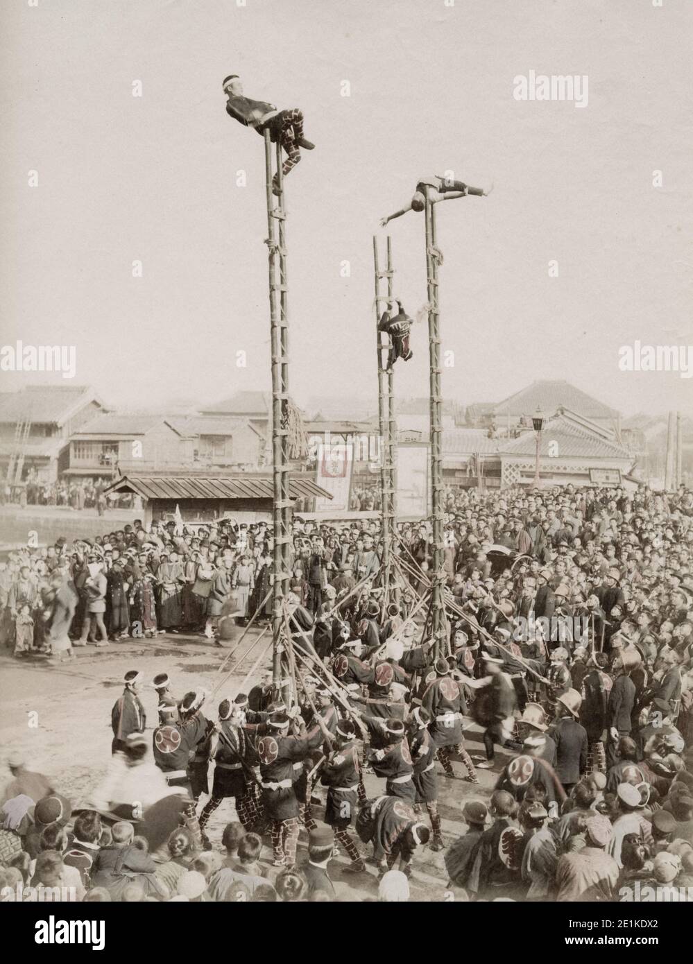 19th century vintage photograph: acrobatic display by Japanese firemen ...