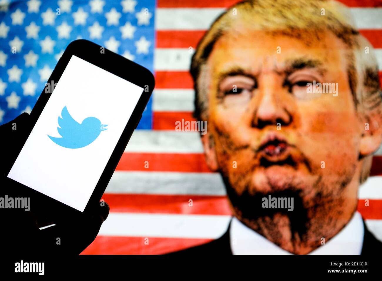 In this photo illustration the Twitter social media app company logo ...