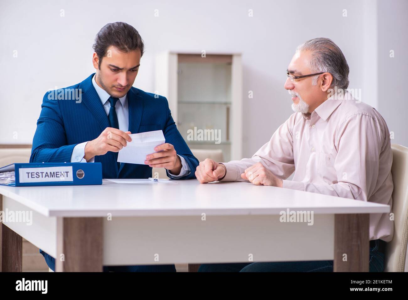 Old man writing last will hi-res stock photography and images - Alamy