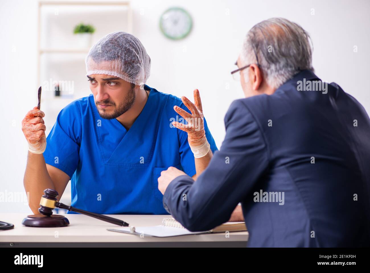 Doctor in courthouse meeting with advocate Stock Photo - Alamy