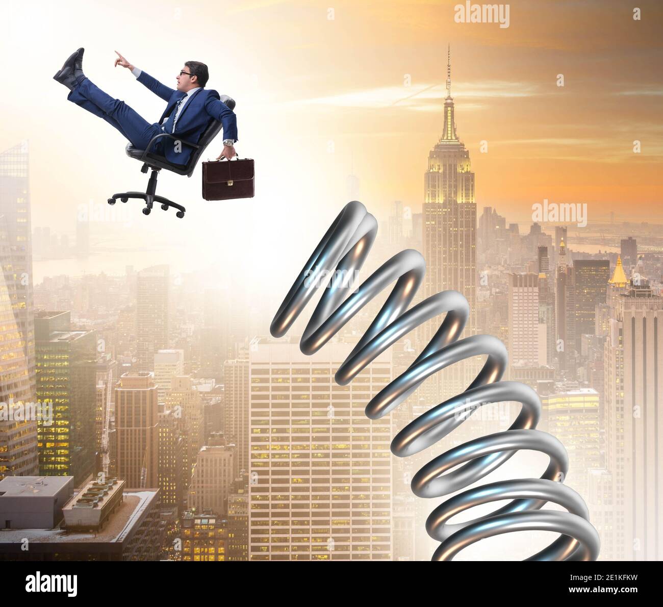 The businessman jumping from spring in promotion concept Stock Photo ...