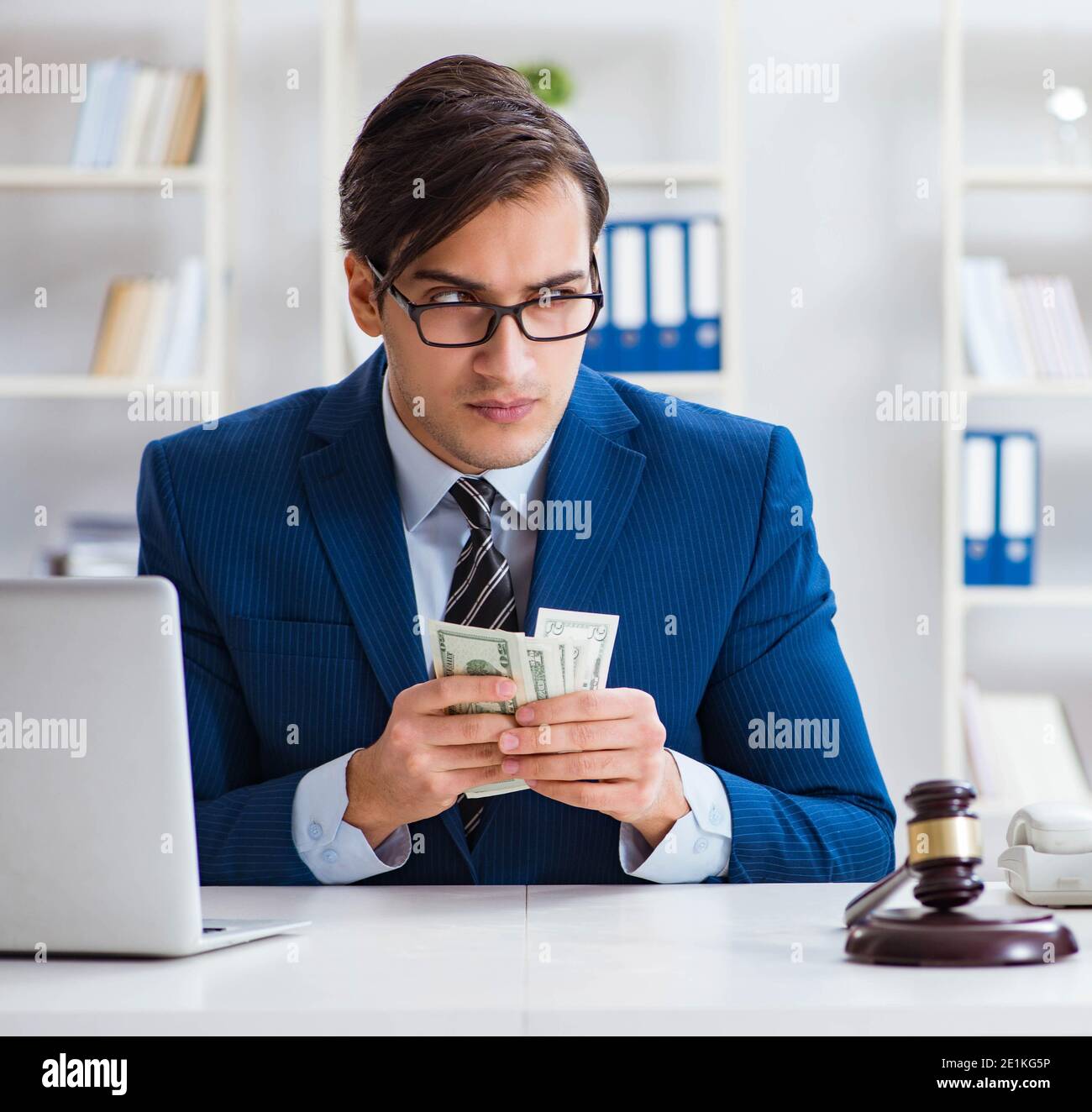 Lawyer receiving money as bribe hi-res stock photography and images - Alamy