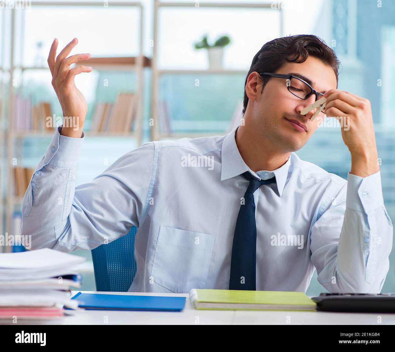 The businessman suffering from excessive armpit sweating Stock Photo ...