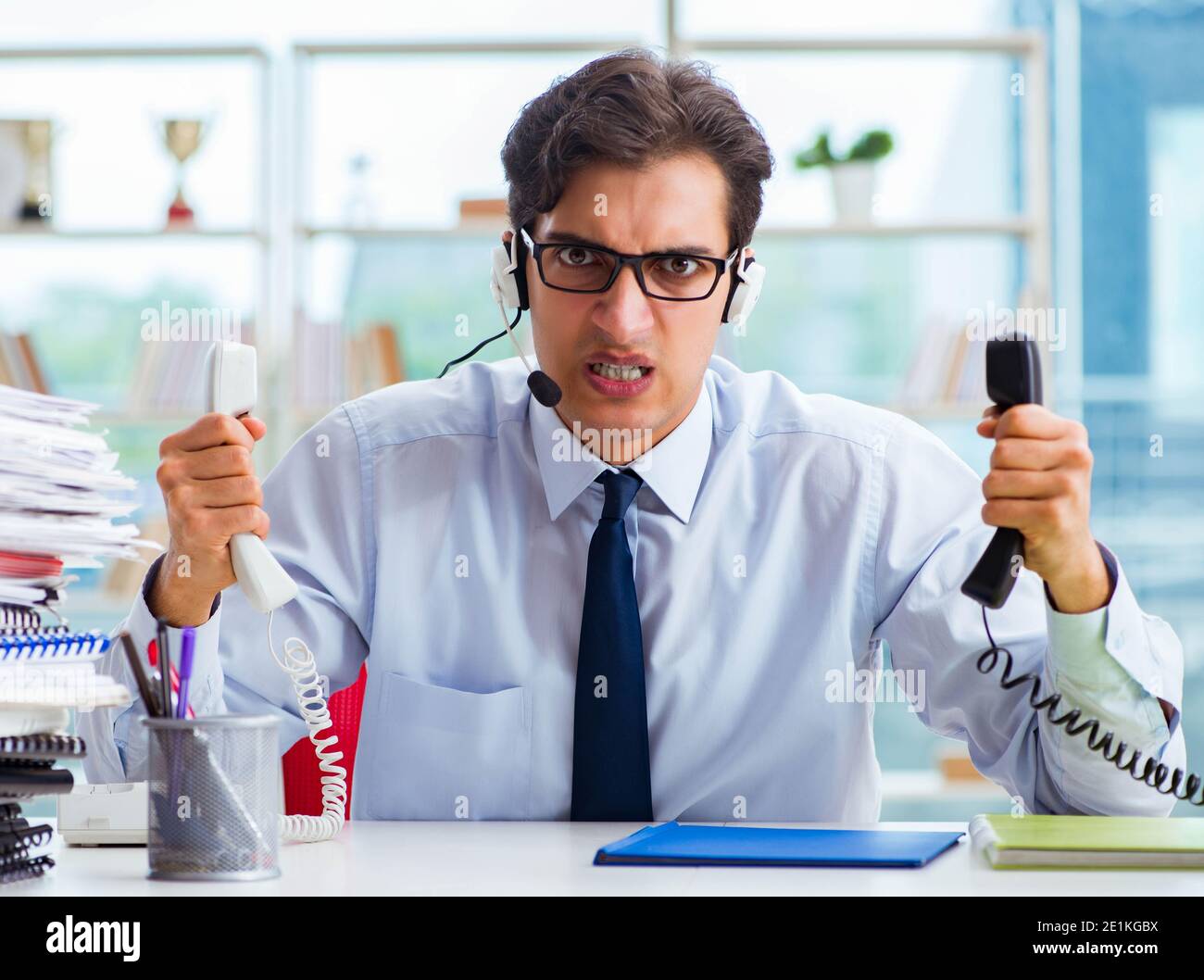 Man call centre unhappy hi-res stock photography and images - Alamy