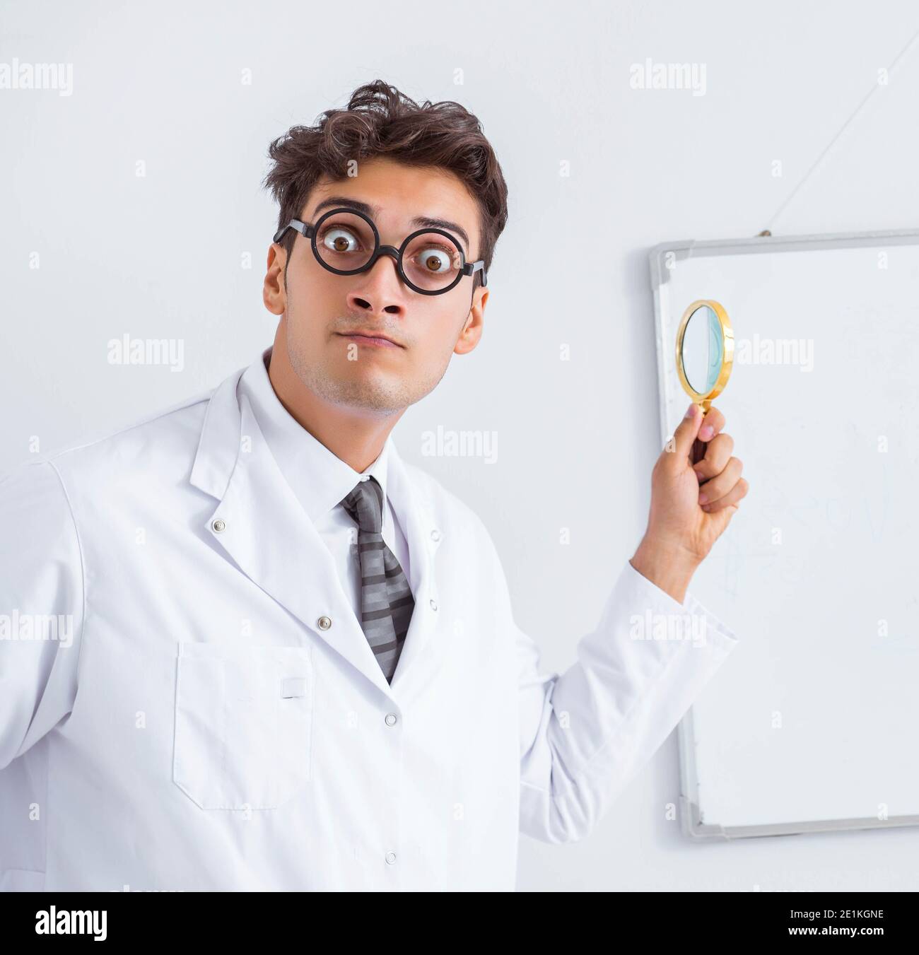 The funny doctor scientist making presentation in hospital Stock Photo ...