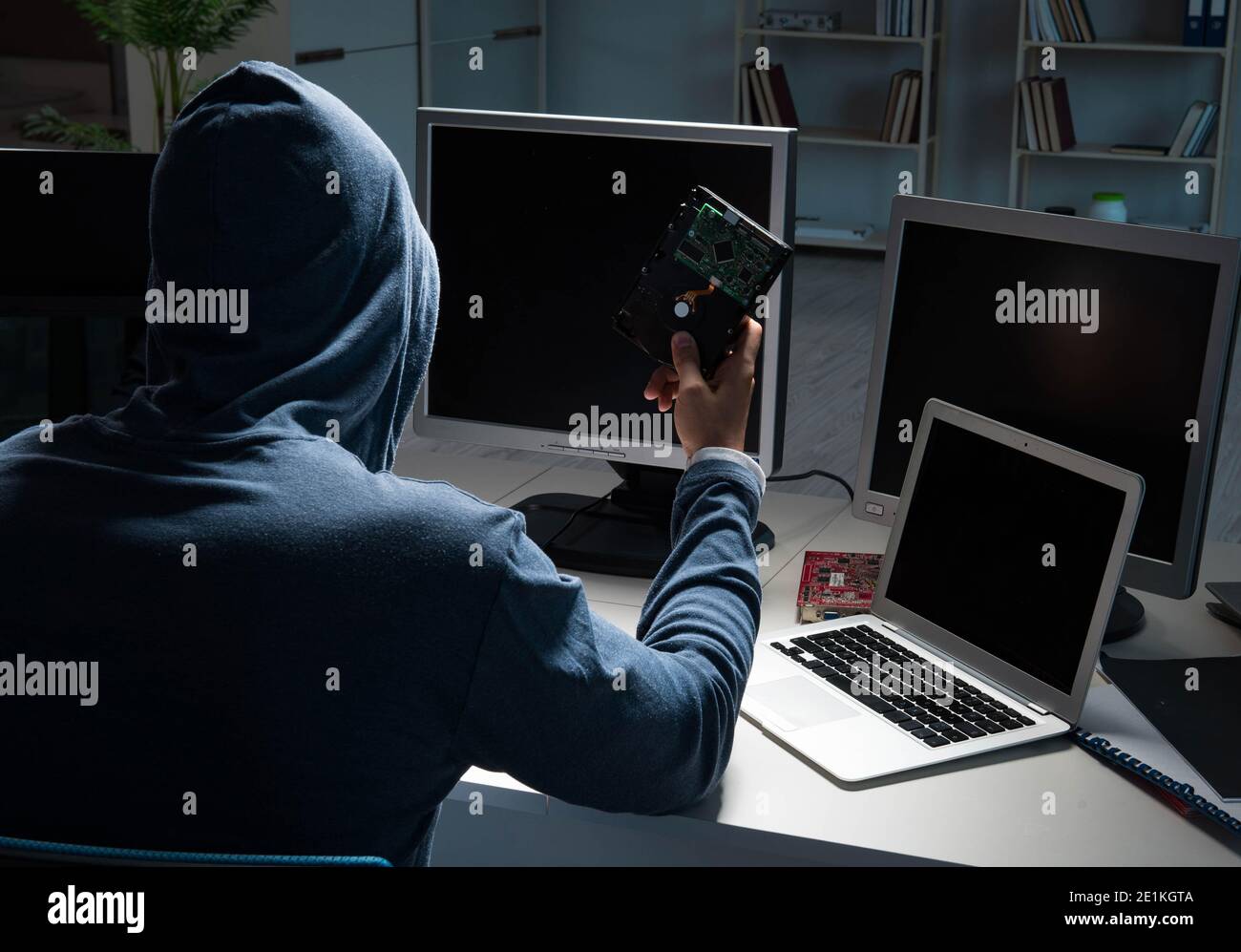 The hacker hacking computer at night Stock Photo - Alamy