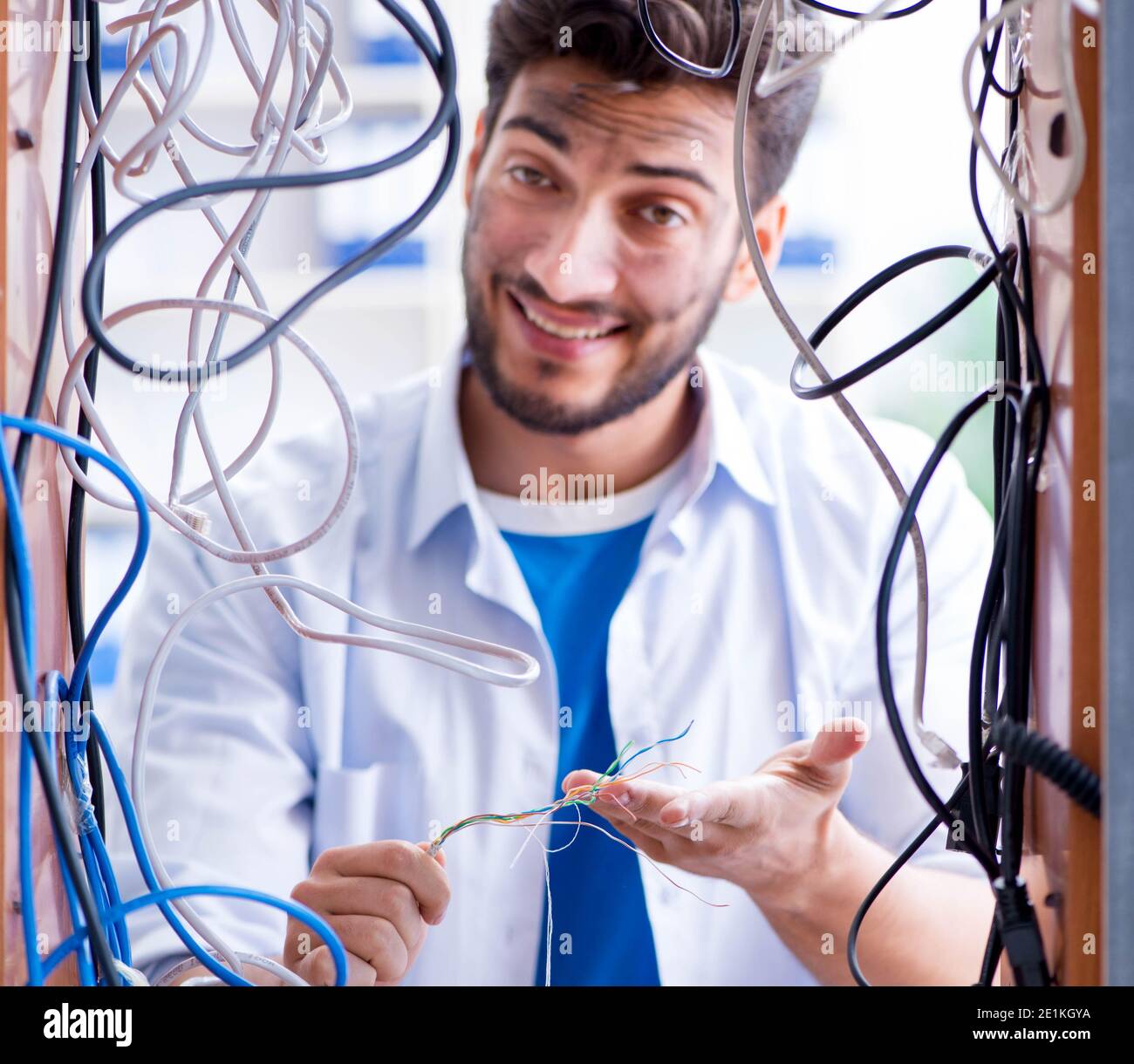 Untangle wires hi-res stock photography and images - Alamy
