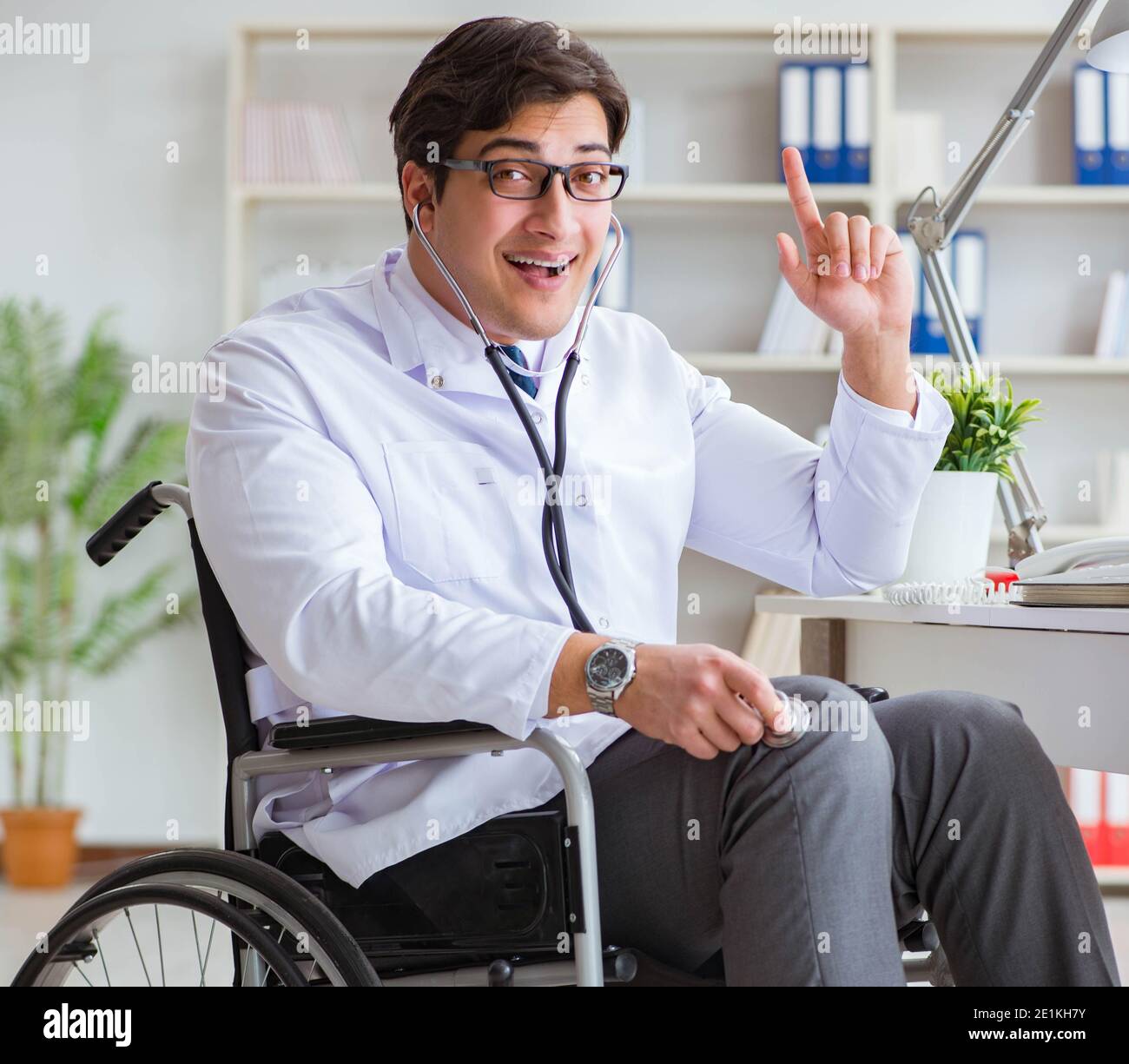 The disabled doctor on wheelchair working in hospital Stock Photo - Alamy