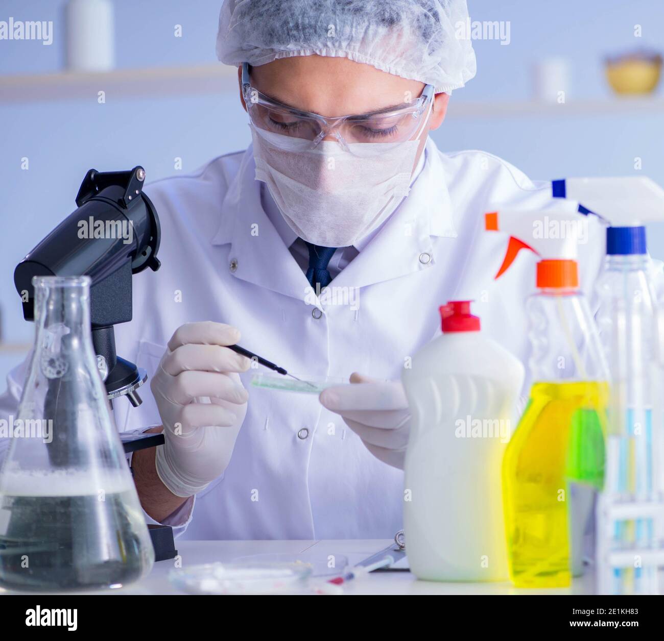 The man in the lab testing new cleaning solution detergent Stock Photo ...