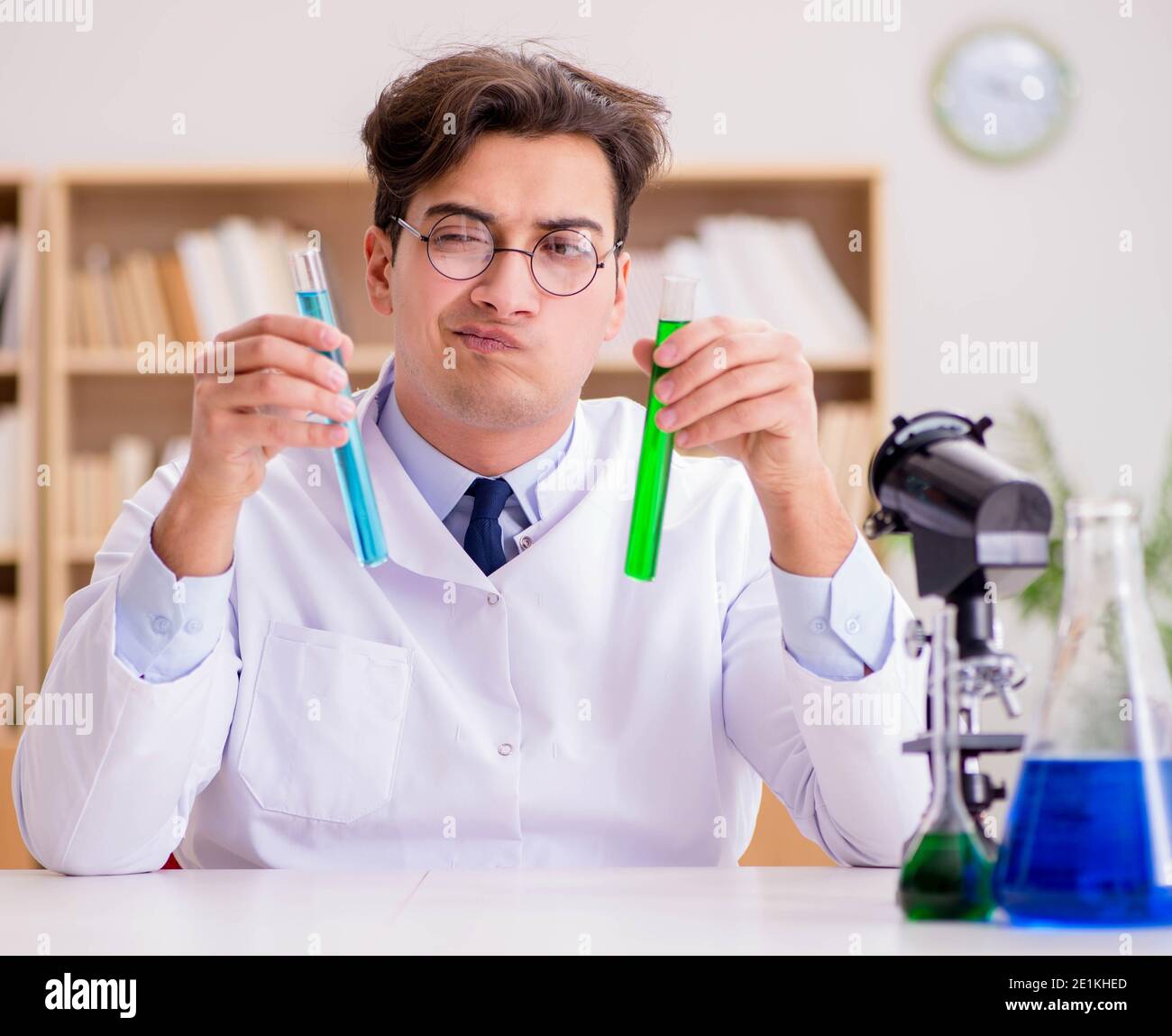 The mad crazy scientist doctor doing experiments in a laboratory Stock ...