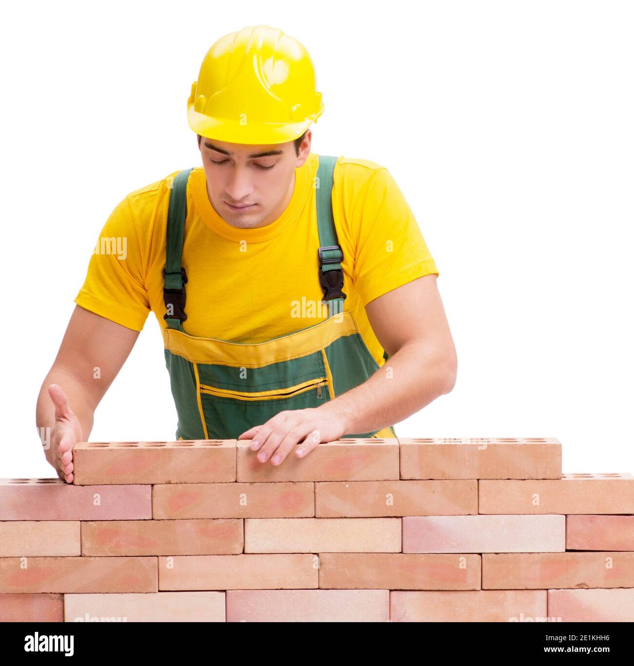 The the handsome construction worker building brick wall Stock Photo ...