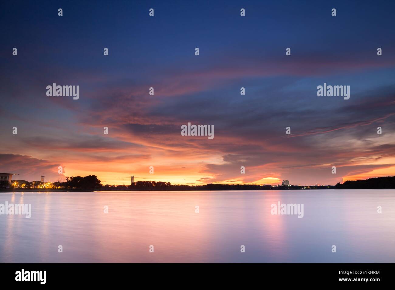 colorful sky reflect in dam Stock Photo - Alamy