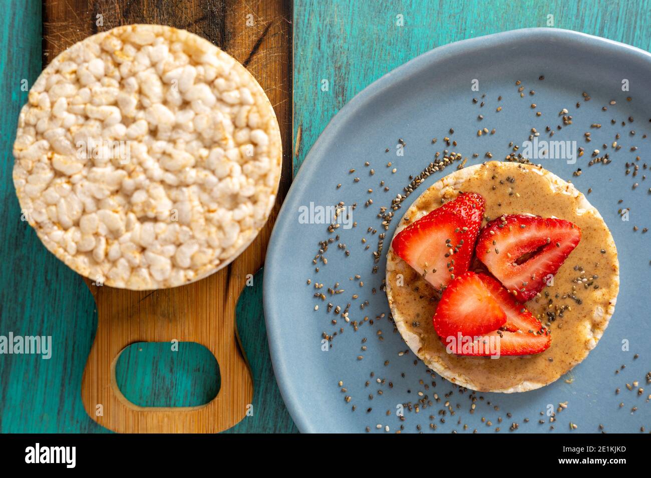 rice crackers, whit fruits on table blue, super food Stock Photo - Alamy