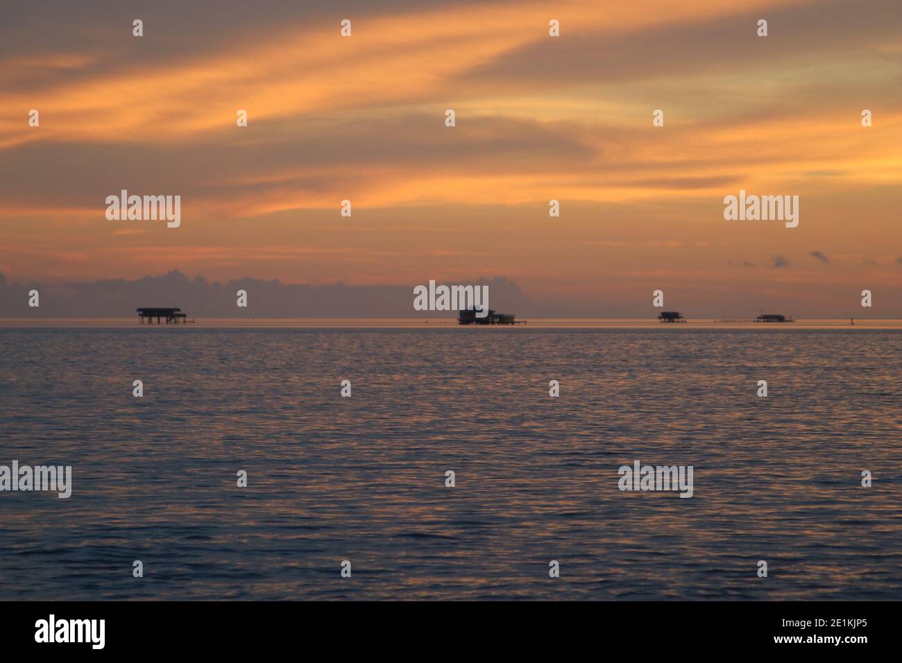 Beautiful sunset in ocean hi-res stock photography and images - Alamy