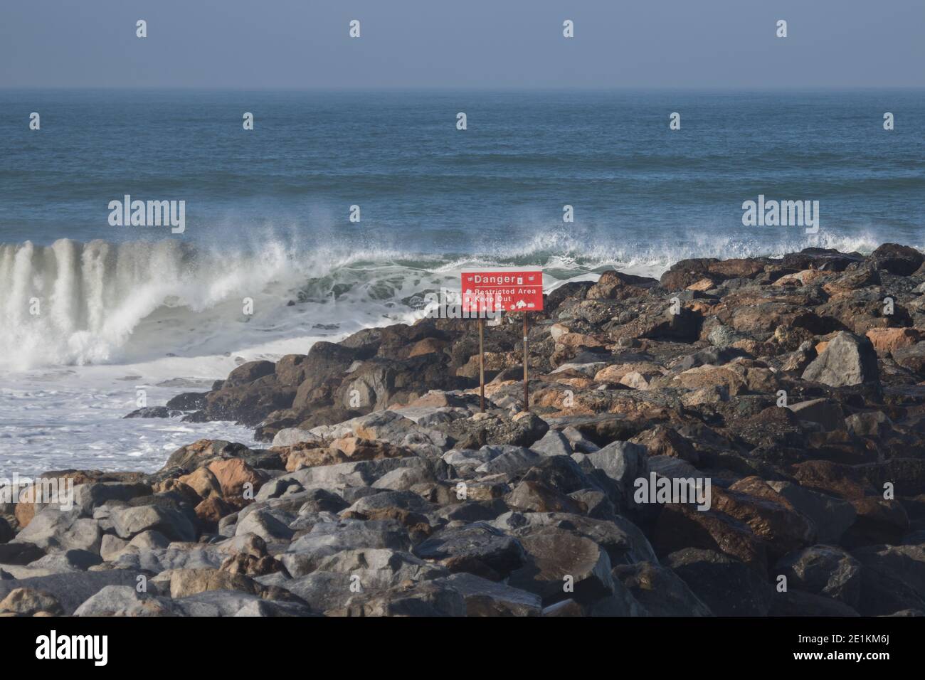 Warning sign rock jetty hi-res stock photography and images - Alamy