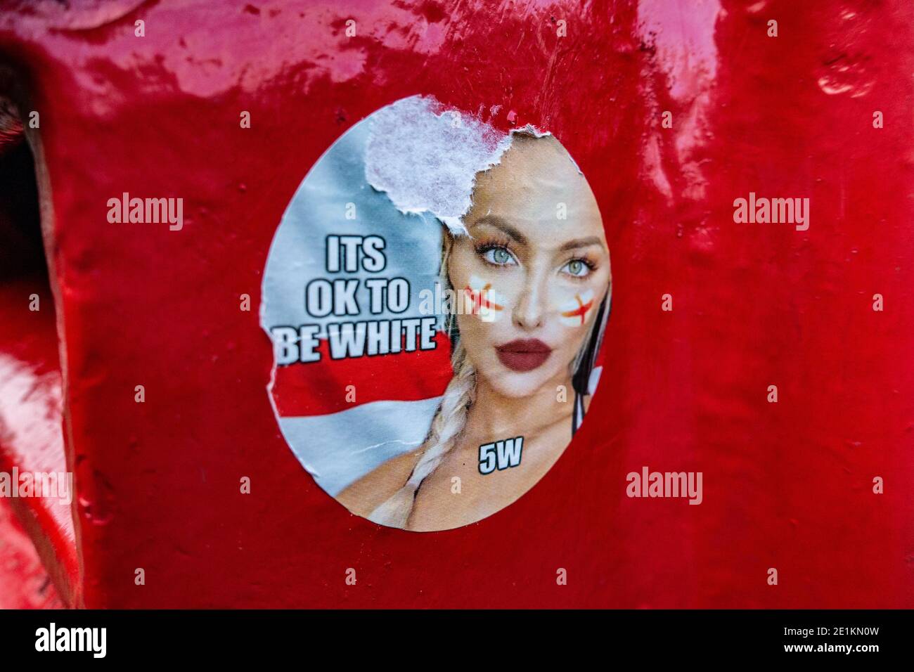 Stickers bearing the slogan "It's okay to be white Stock Photo - Alamy