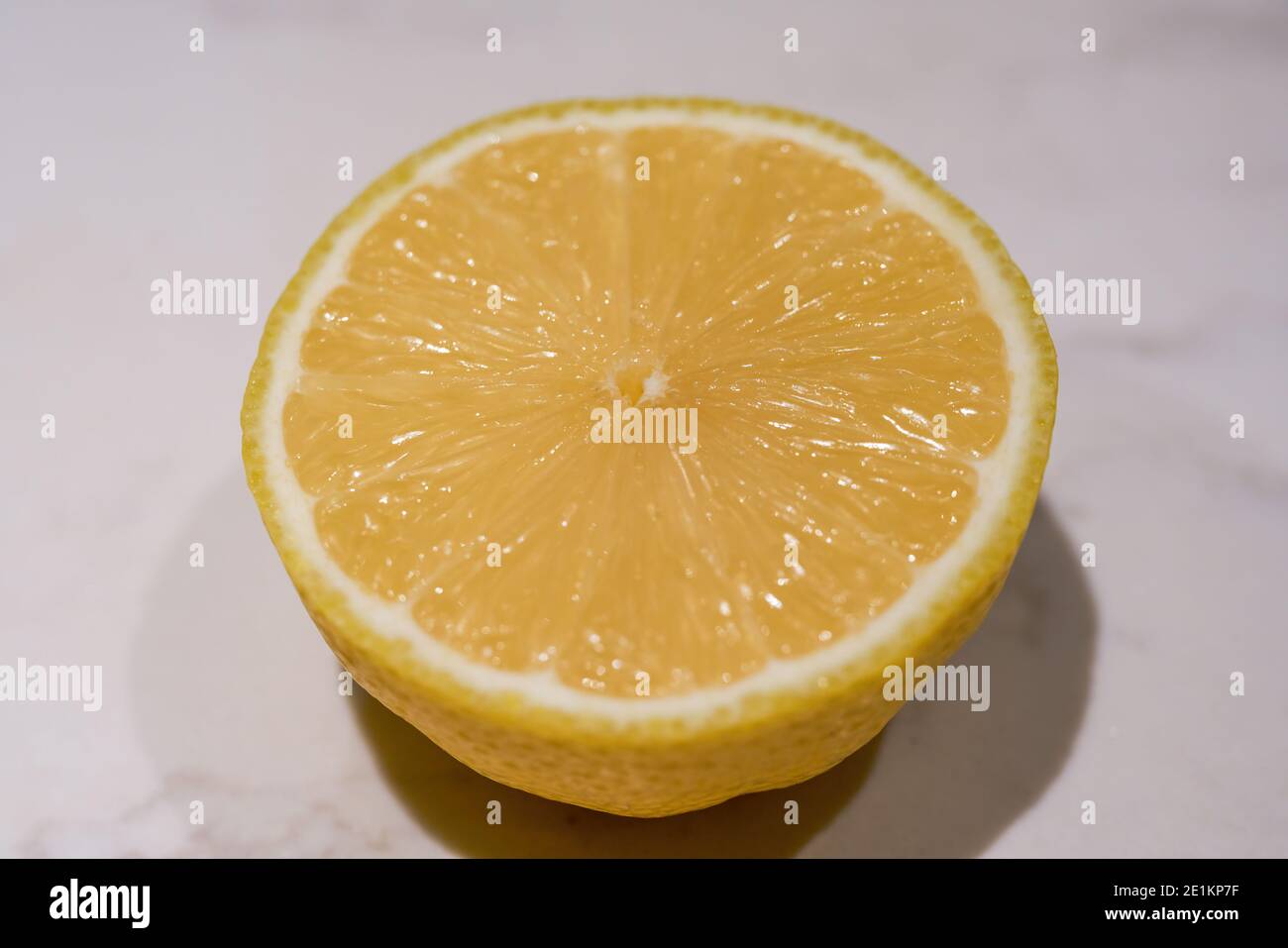 Close-up of a fresh seedless lemon cross section Stock Photo - Alamy