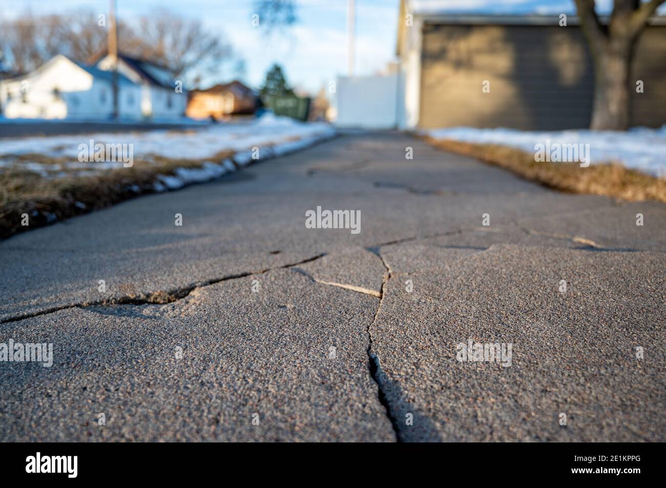 damaged concrete slabs caused by soil structure heave Stock Photo - Alamy