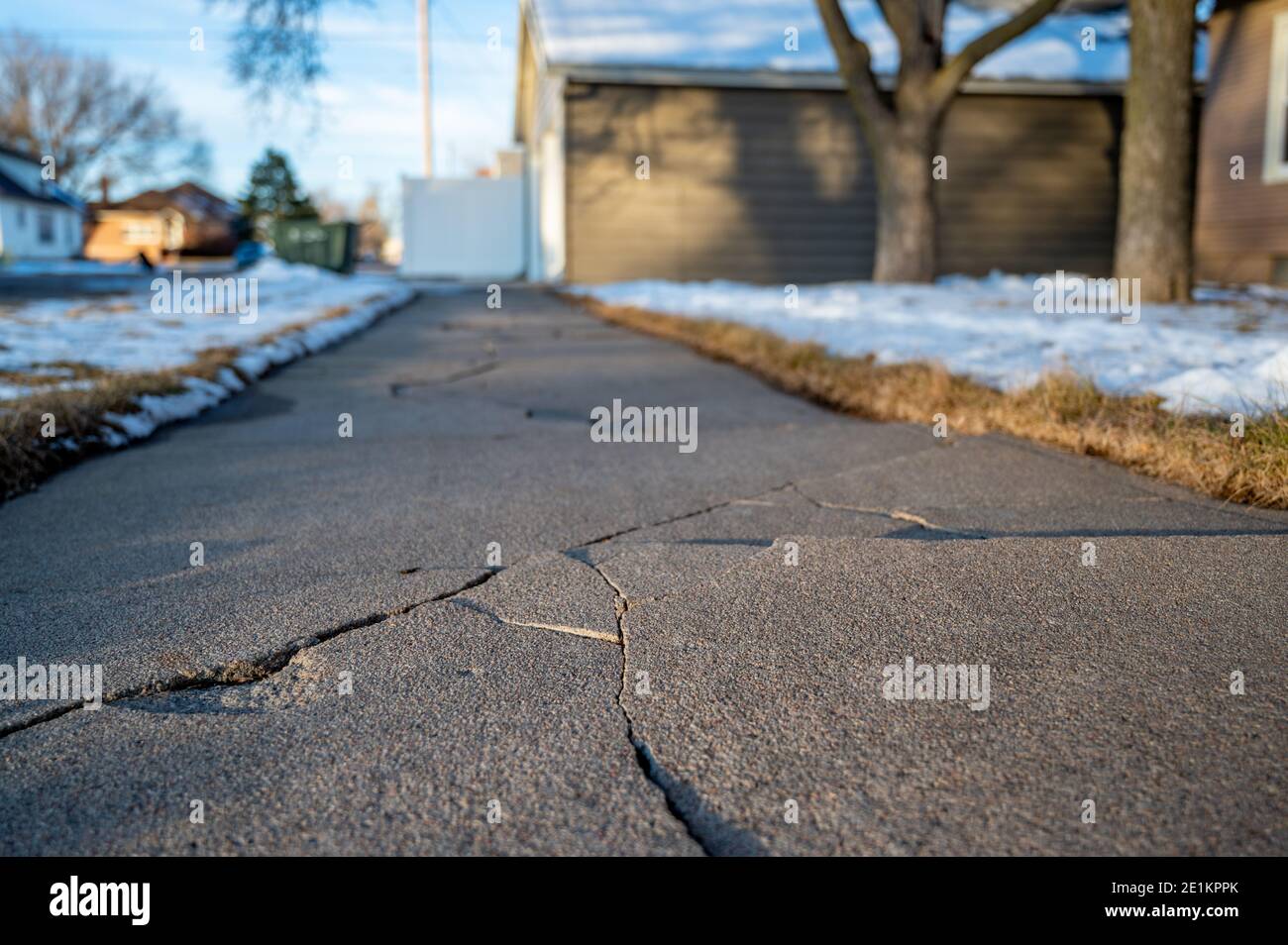 damaged concrete slabs caused by soil structure heave Stock Photo - Alamy