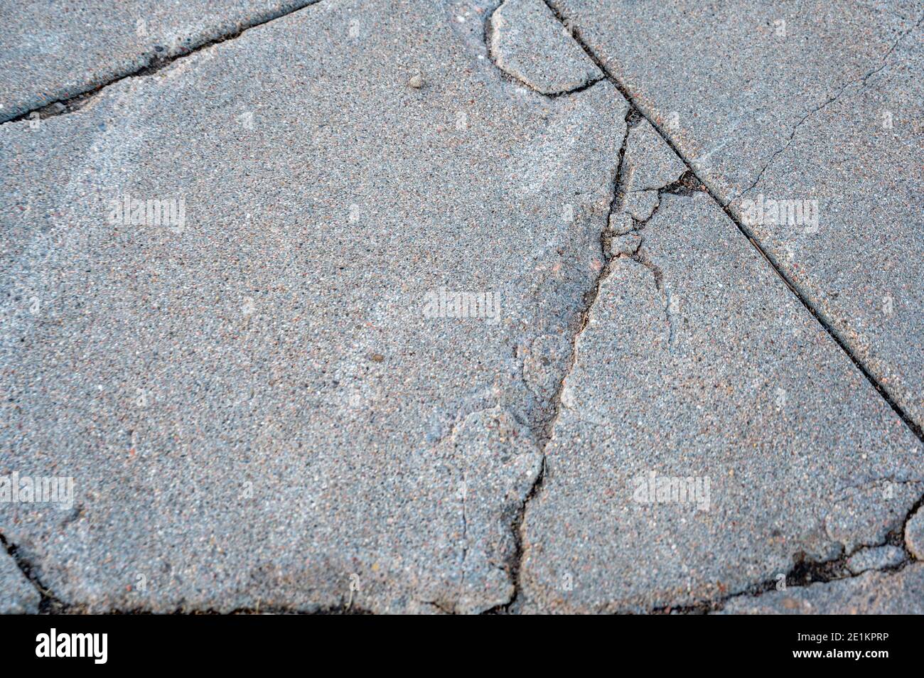 damaged concrete slabs caused by soil structure heave Stock Photo - Alamy