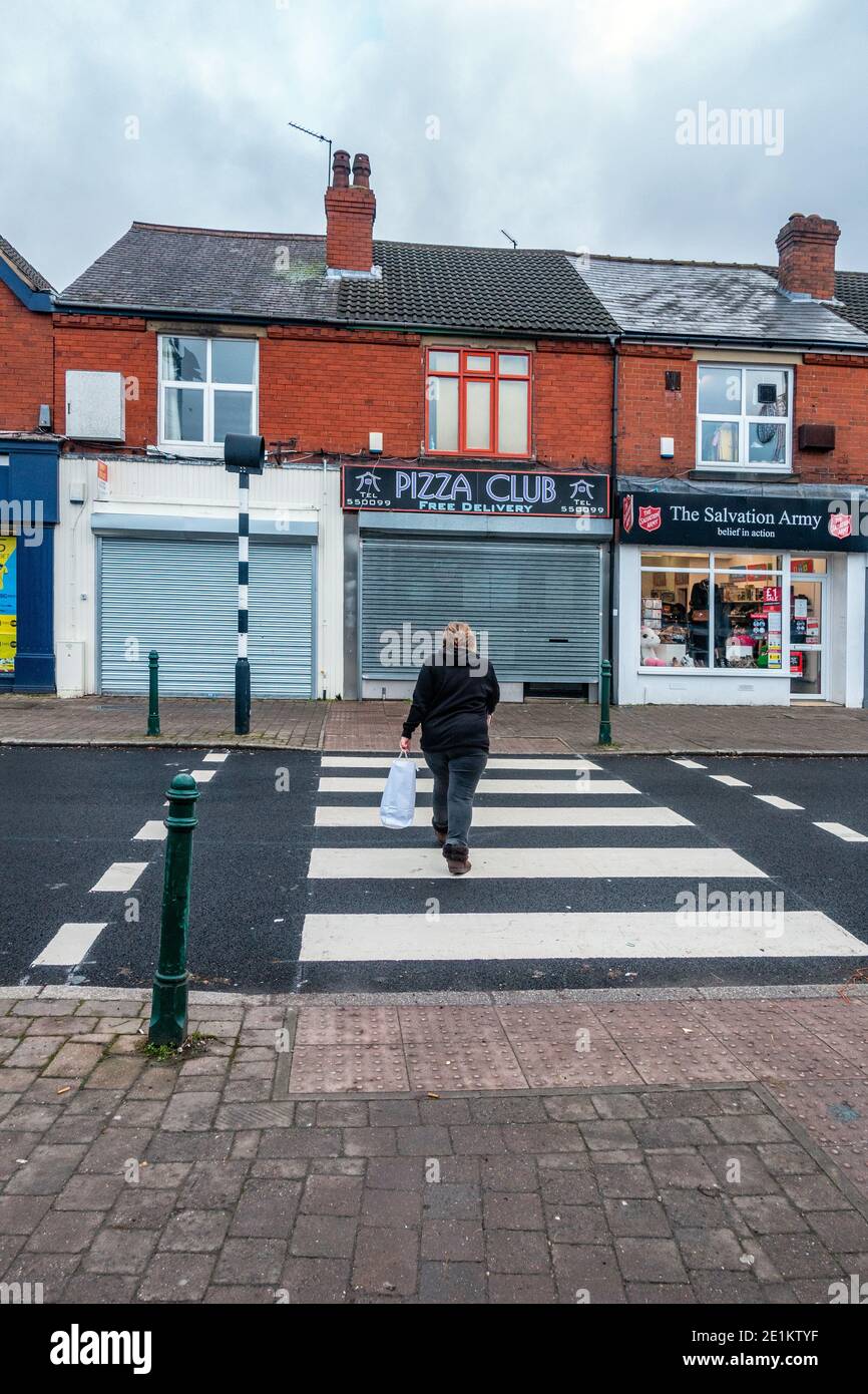 Lady crossing a road hi-res stock photography and images - Alamy