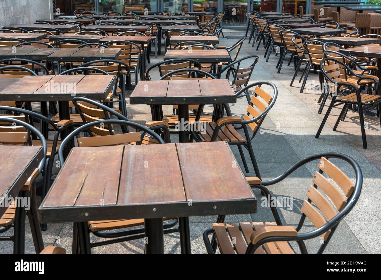 Lost of tables and chairs at restaurant or pub Stock Photo - Alamy