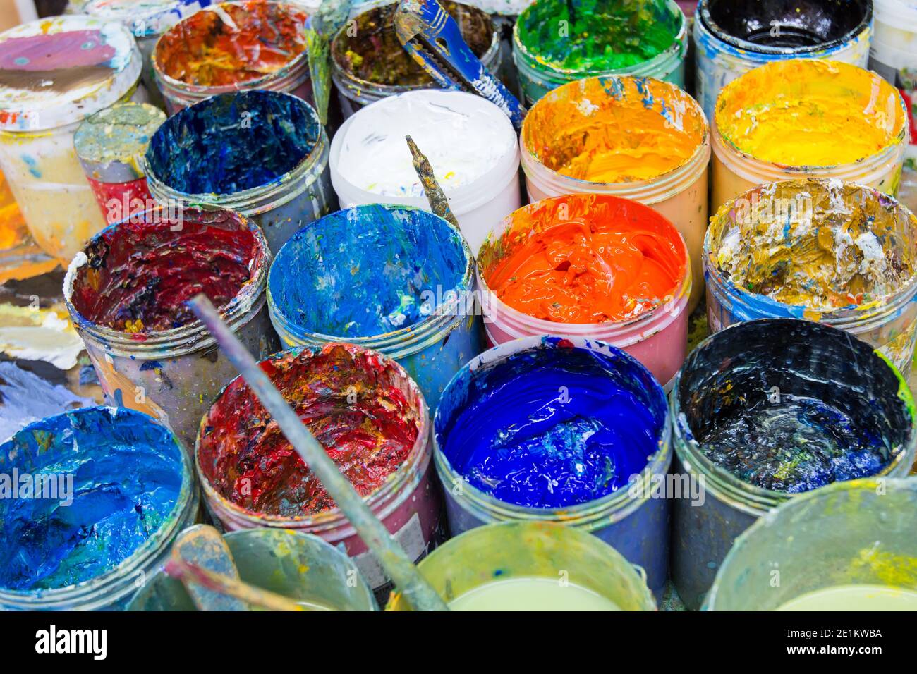 Colorful pigments in barrels for artist of oil painting Stock Photo - Alamy