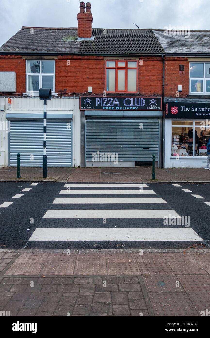 street crossing on town road with closed shops Stock Photo - Alamy