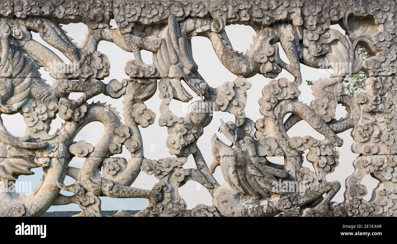 Chinese dragon culture - Chinese dragon carved in the stone wall Stock ...