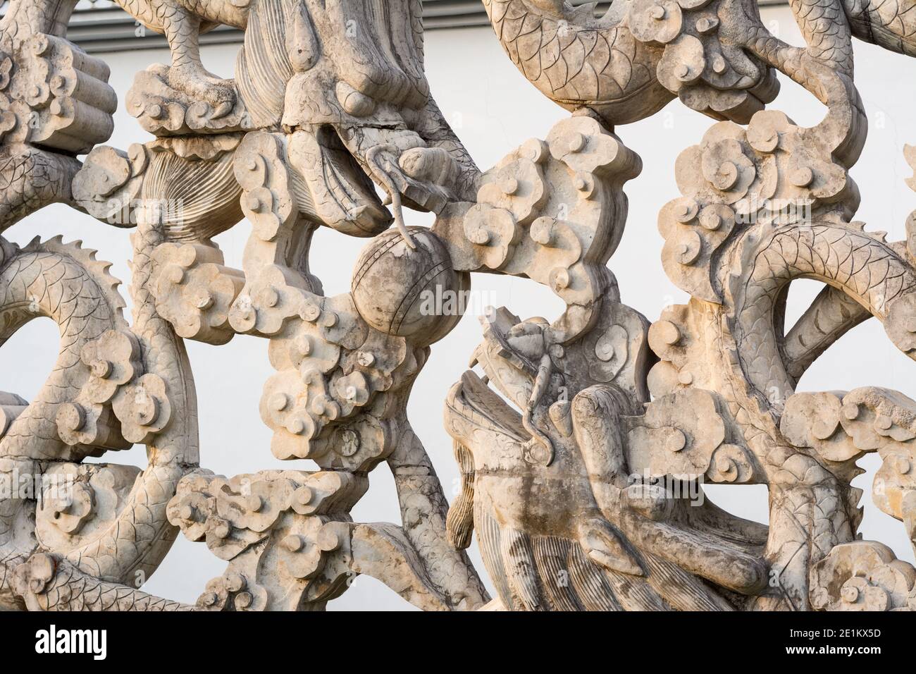 Chinese dragon culture - Chinese dragon carved in the stone wall Stock ...